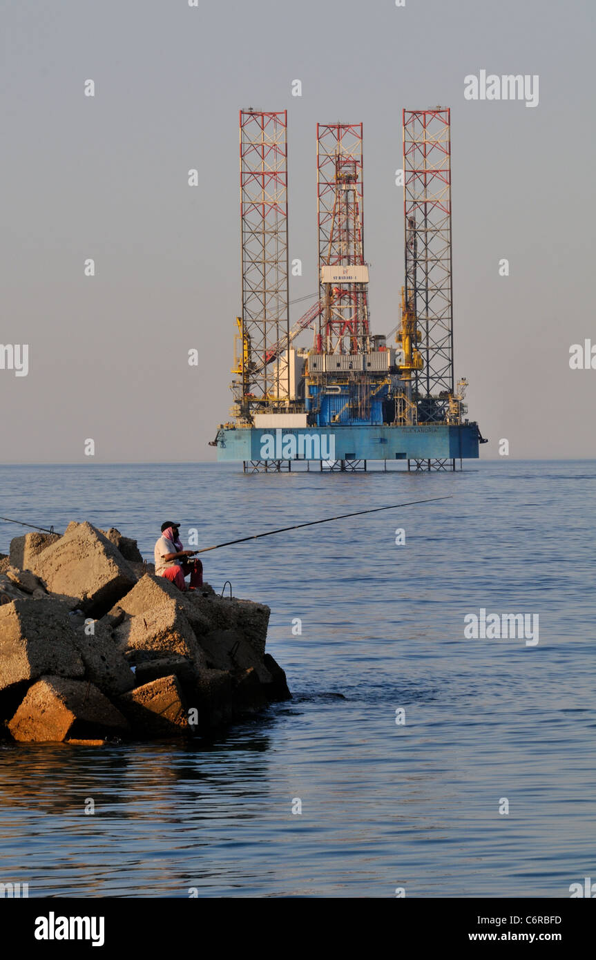 A jackup oil rig lies in the shallow waters of the Red Sea off the ...