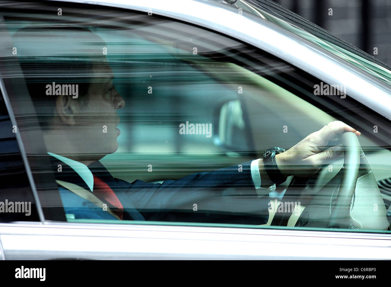 King Abdullah of Jordan drives his own car as he leaves 10 Downing ...