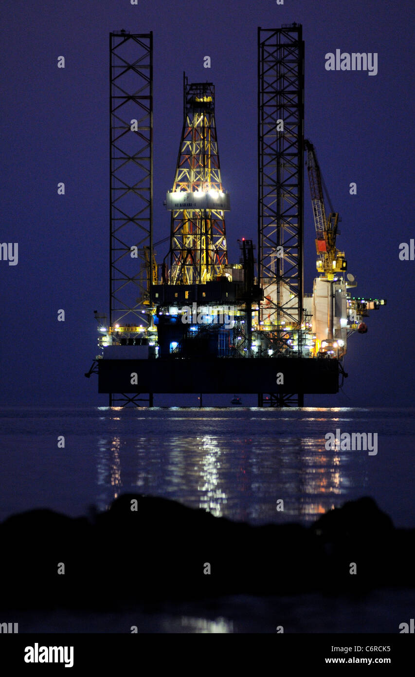 A jackup oil rig lies in the shallow waters of the Red Sea off the ...