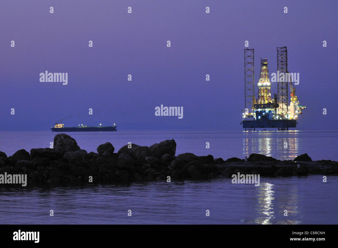 A jackup oil rig lies in the shallow waters of the Red Sea off the ...