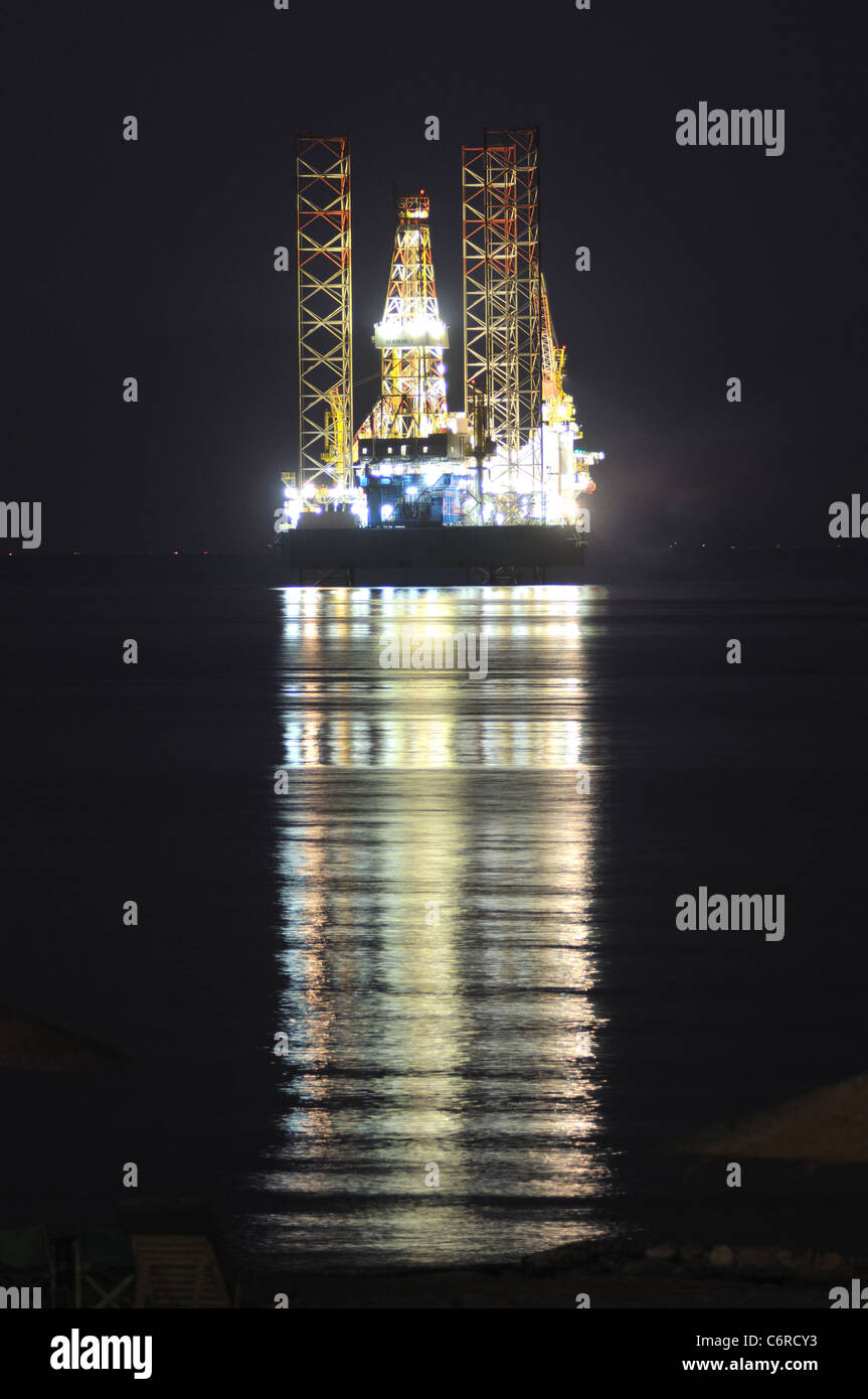A jackup oil rig lies in the shallow waters of the Red Sea off the ...