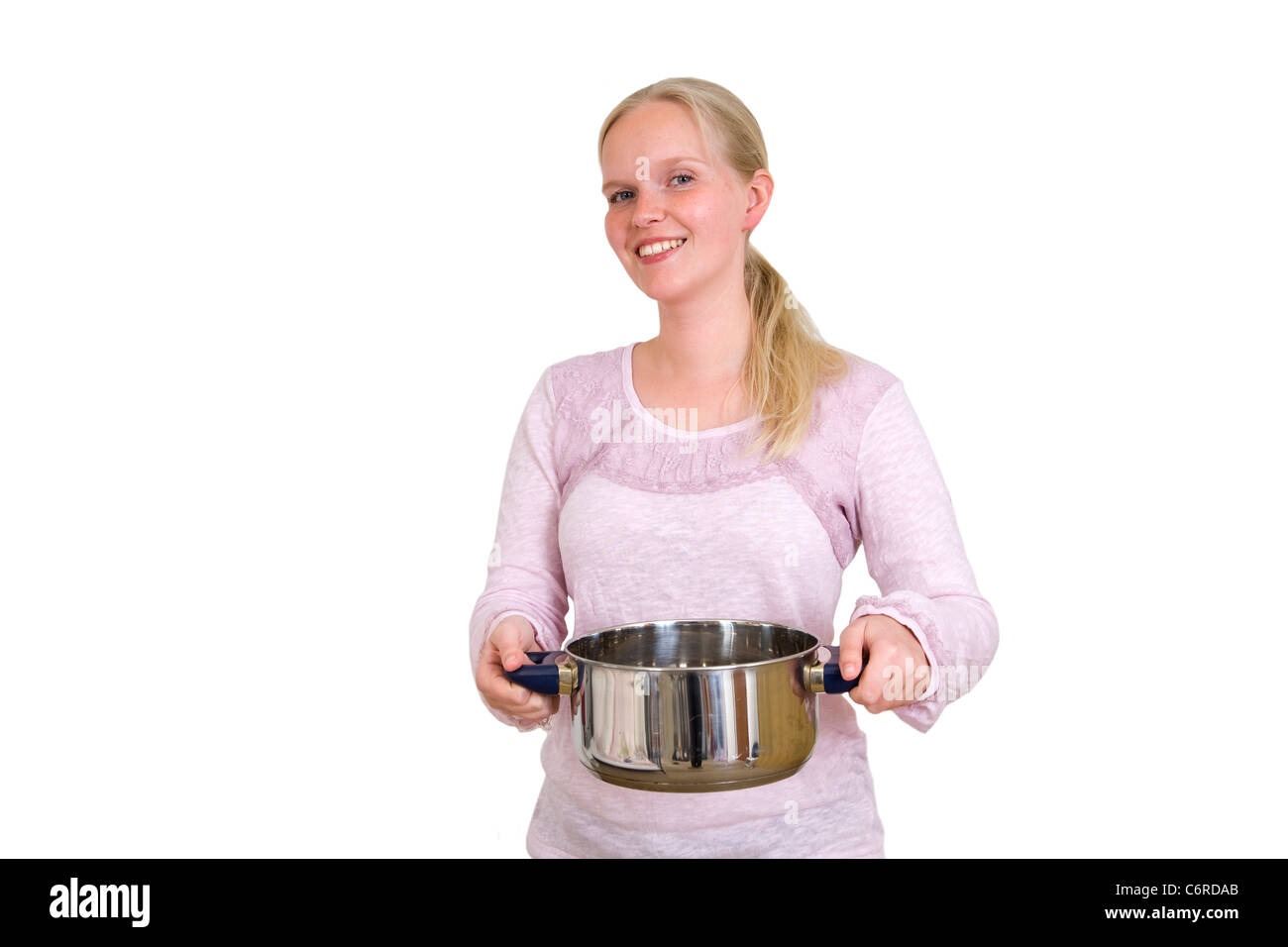 Young woman cooking Stock Photo - Alamy