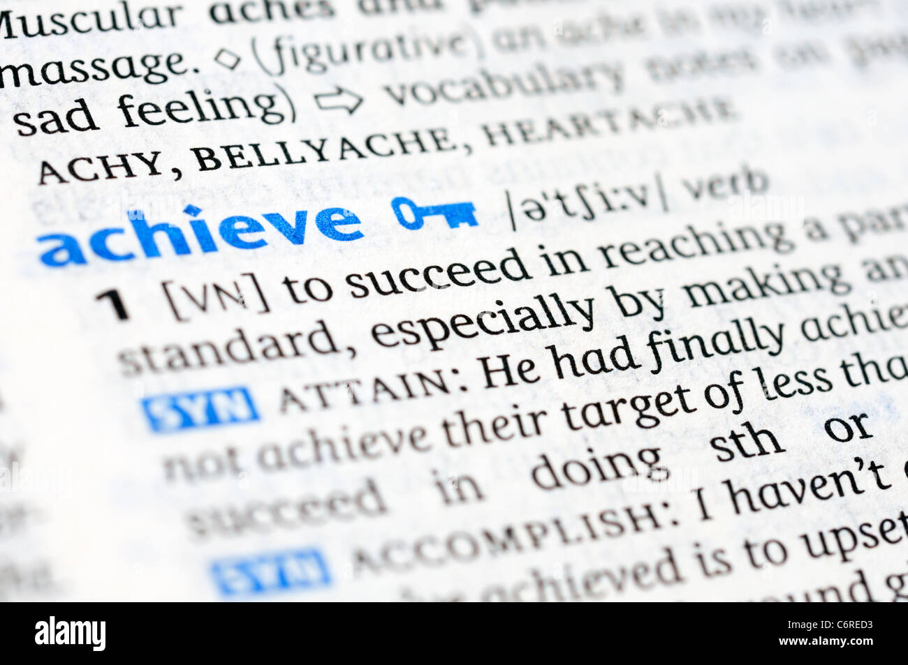 ACHIEVE word closeup in dictionary Stock Photo - Alamy
