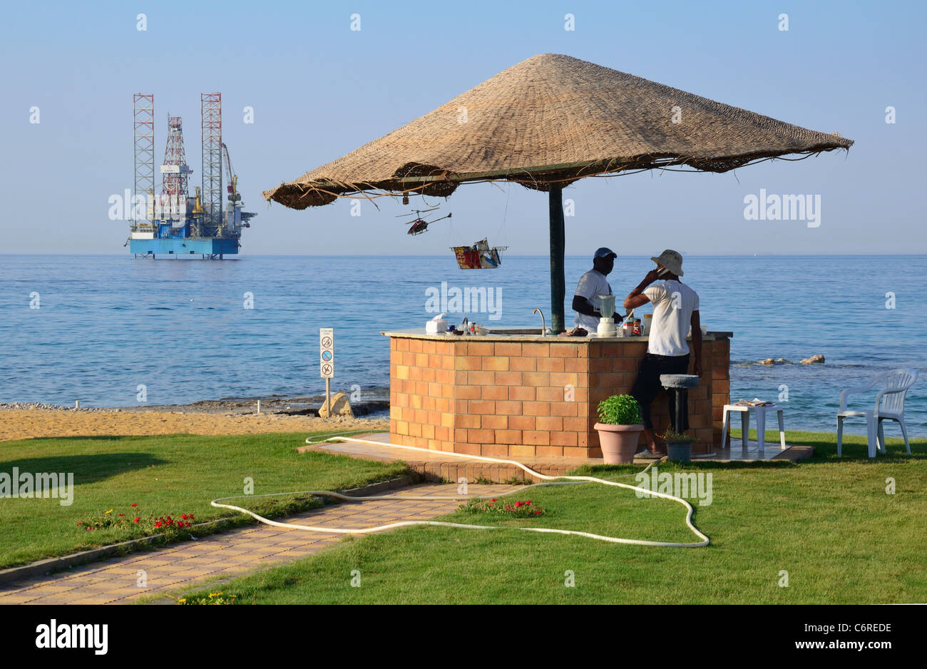 A jackup oil rig lies in the shallow waters of the Red Sea off the ...