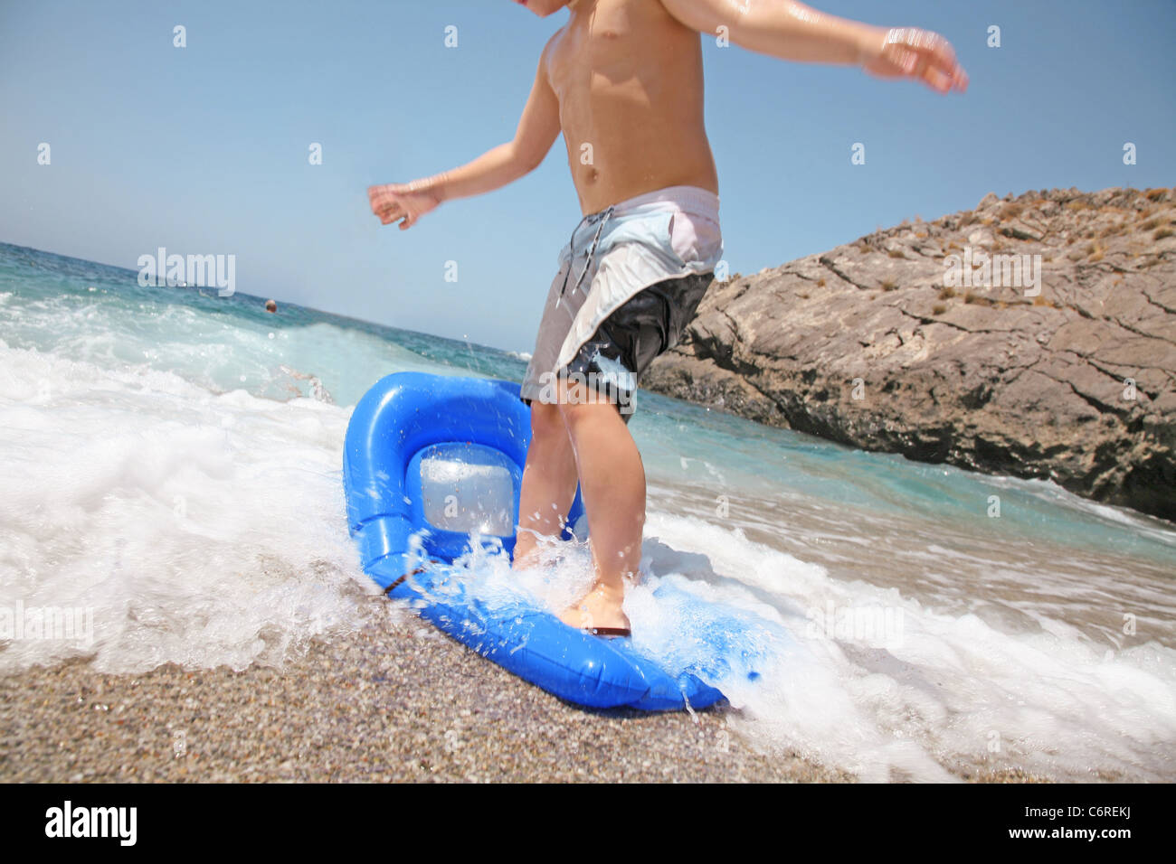 Children Surfing Waves Blue Stock Photos & Children Surfing Waves Blue ...