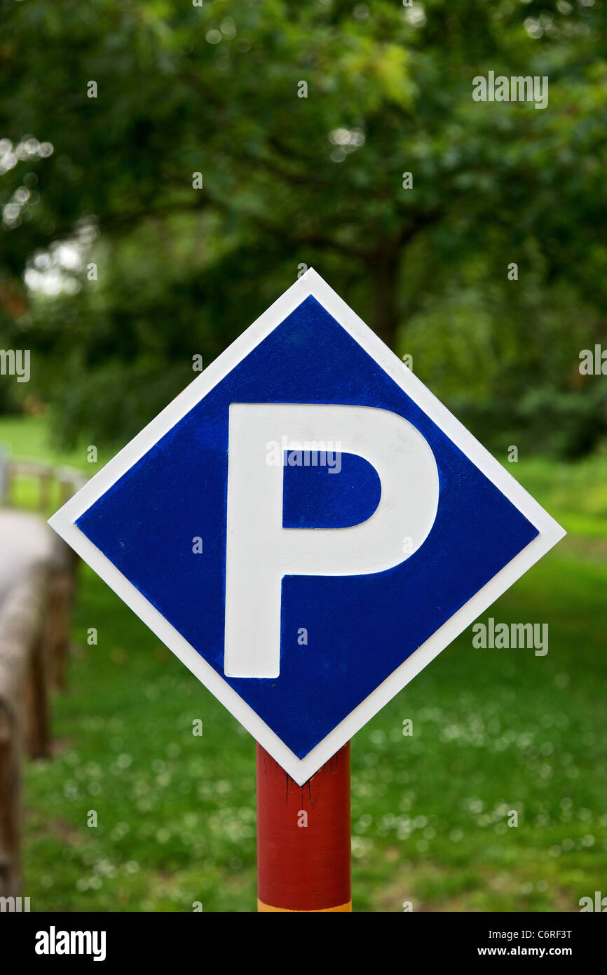 Parking signal at forest Stock Photo - Alamy