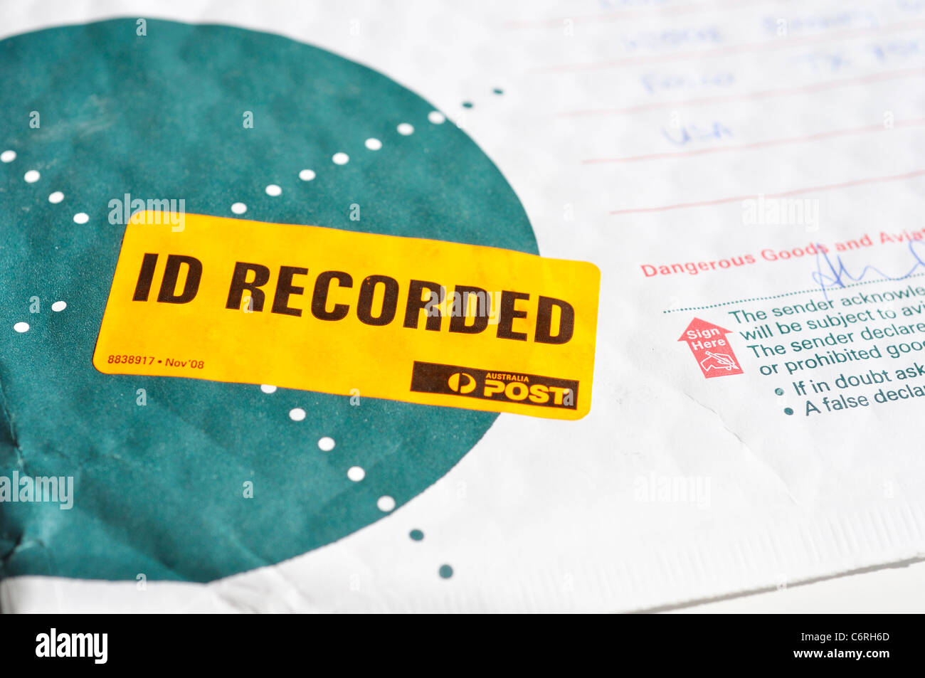 ID RECORDED sticker on mail package envelope Stock Photo - Alamy