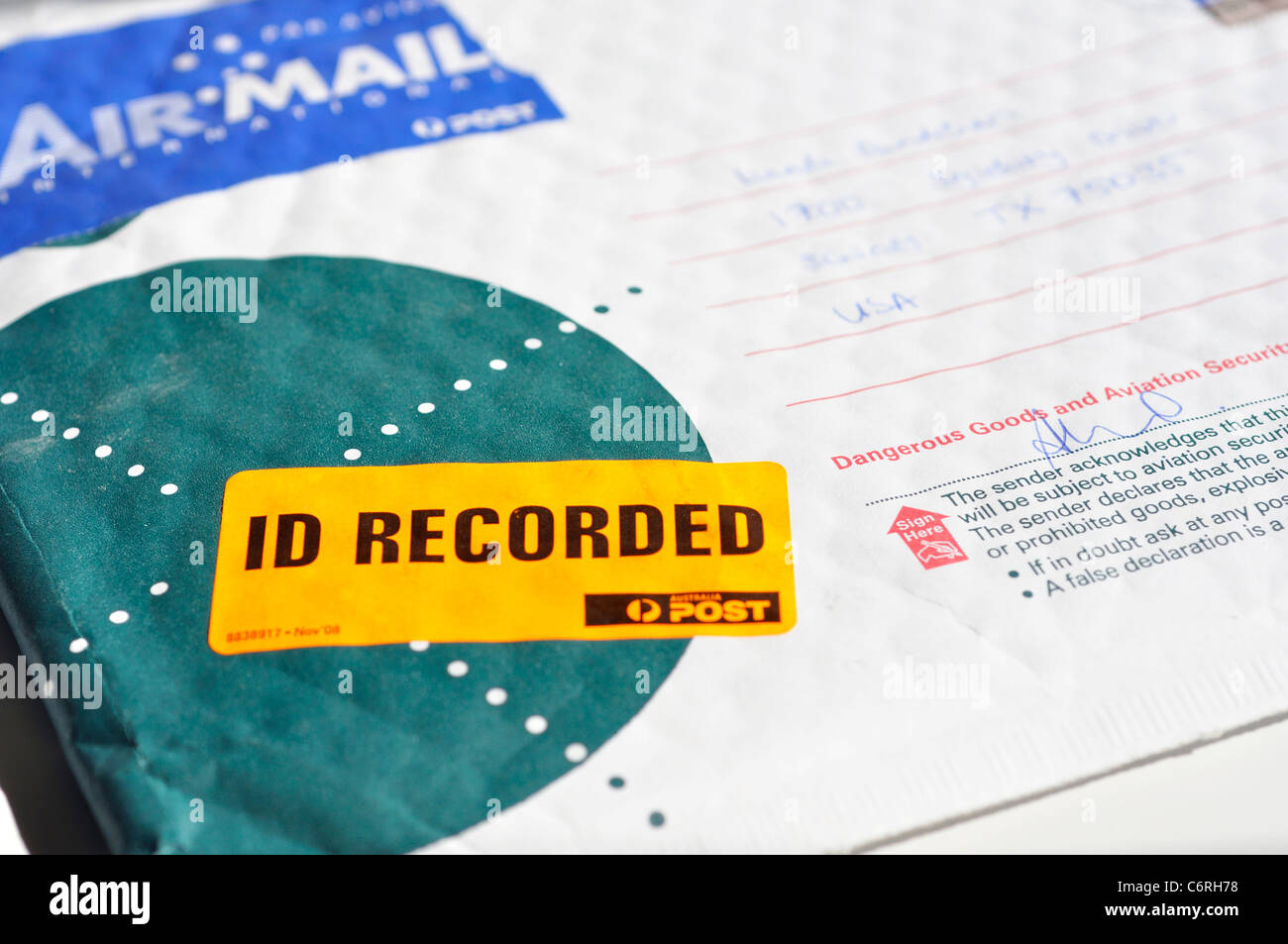 ID RECORDED sticker on mail package envelope Stock Photo - Alamy