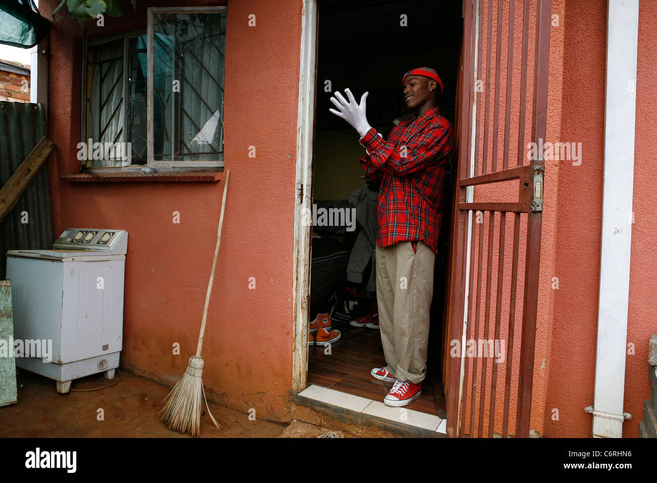 Pantsula dancer Sibusiso Mthembu, 21, puts on his which gloves which ...