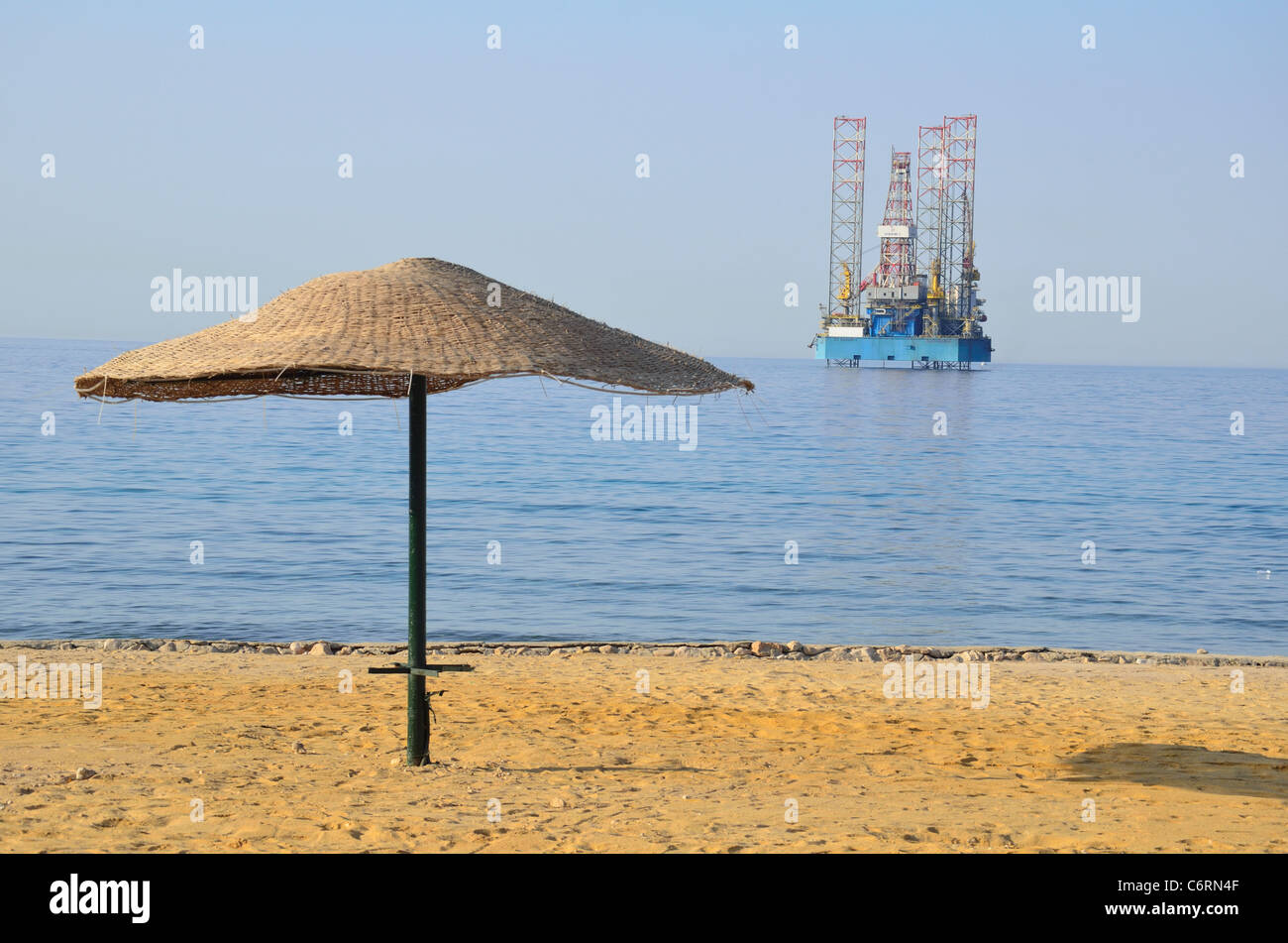 A jackup oil rig lies in the shallow waters of the Red Sea off the ...