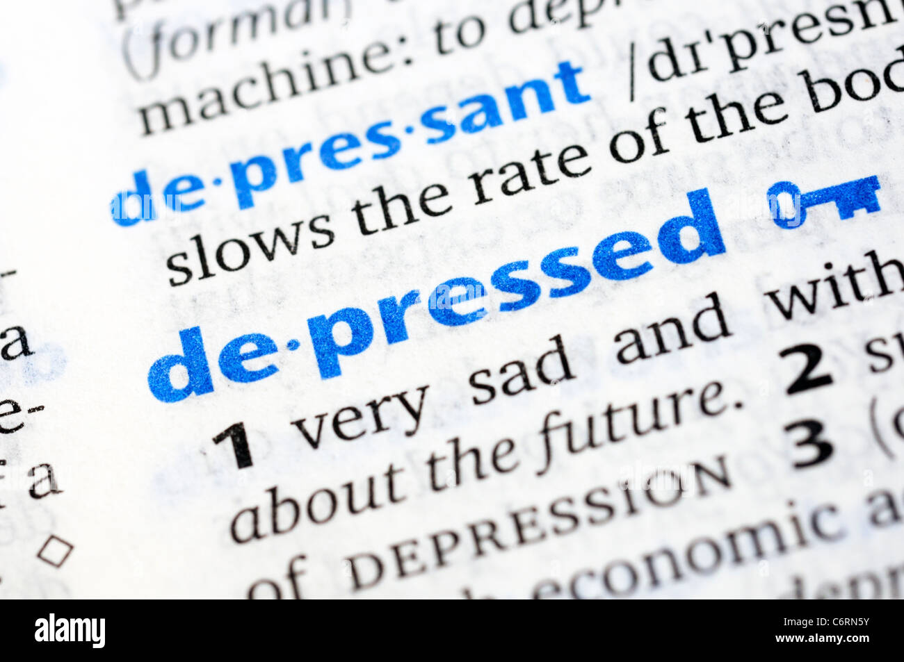 DEPRESSED word closeup in dictionary Stock Photo - Alamy