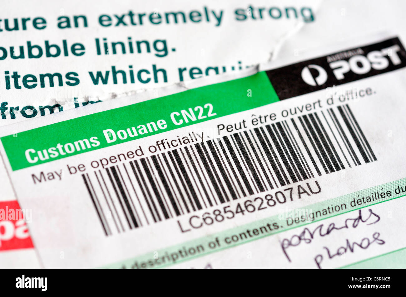 Customs sticker on mail package Stock Photo - Alamy