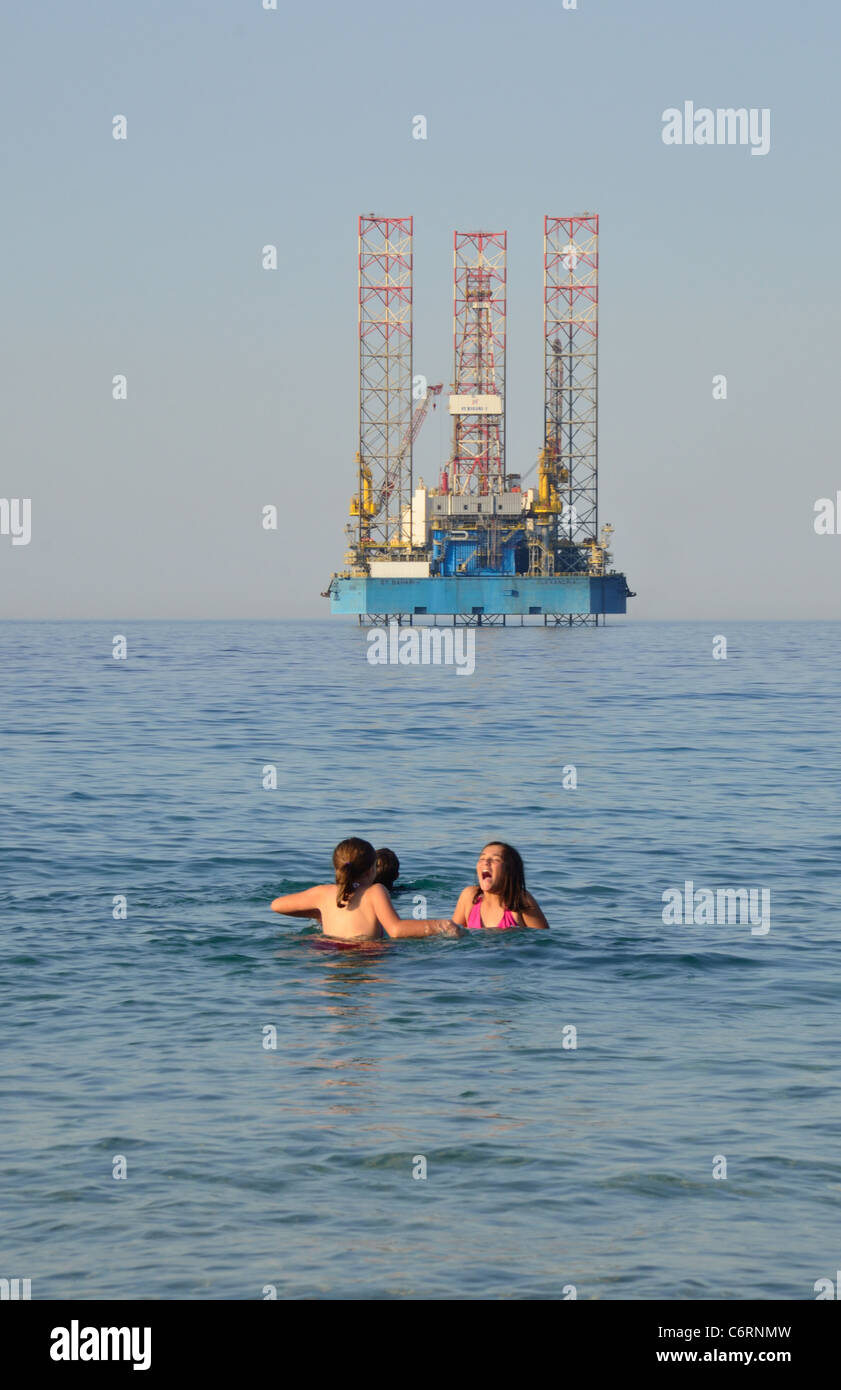A jackup oil rig lies in the shallow waters of the Red Sea off the ...