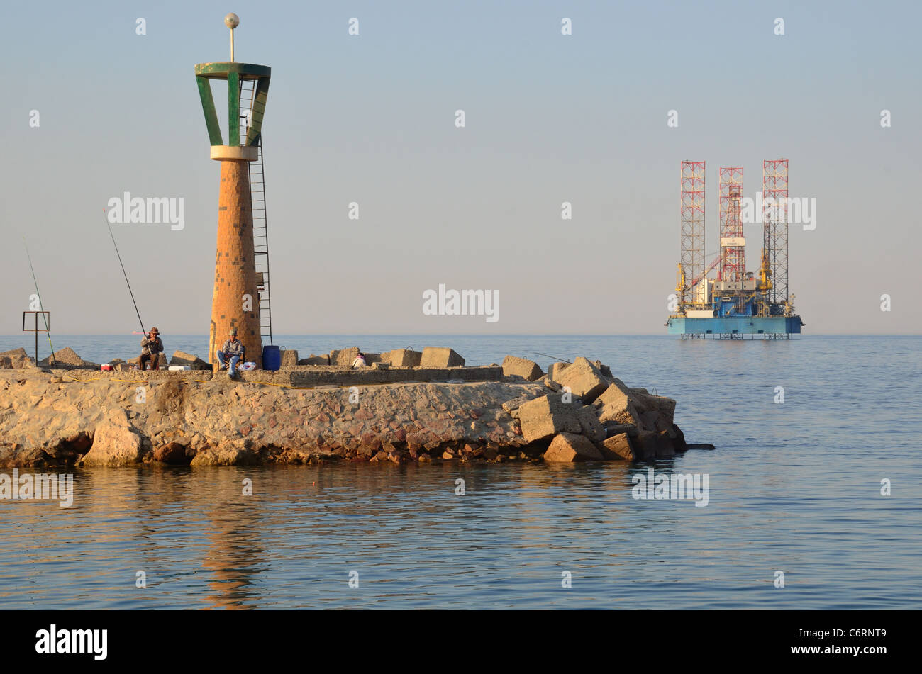 A jackup oil rig lies in the shallow waters of the Red Sea off the ...