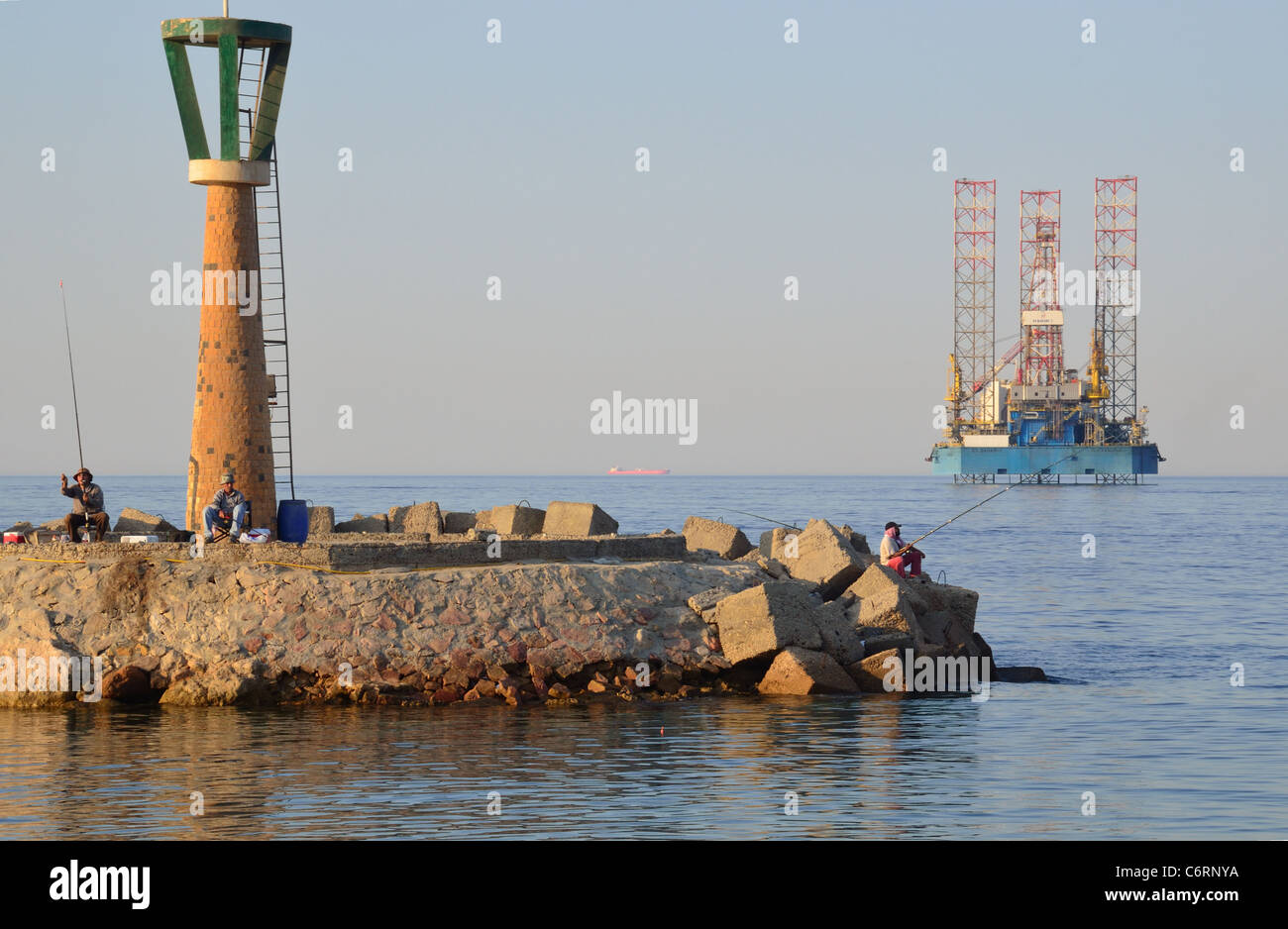 A jackup oil rig lies in the shallow waters of the Red Sea off the ...