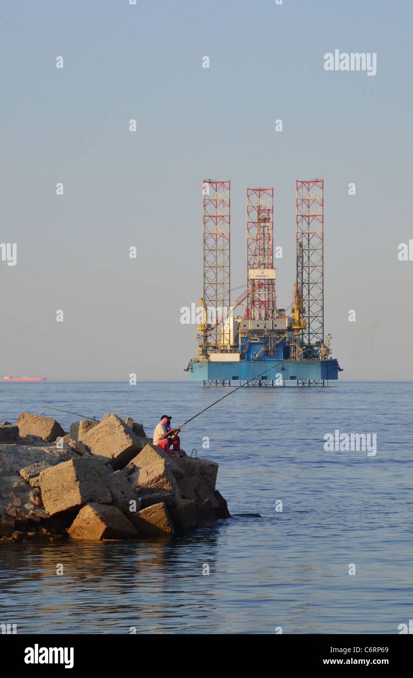 A jackup oil rig lies in the shallow waters of the Red Sea off the ...