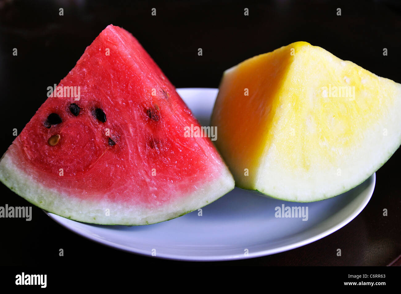 Red and yellow watermelons Stock Photo - Alamy