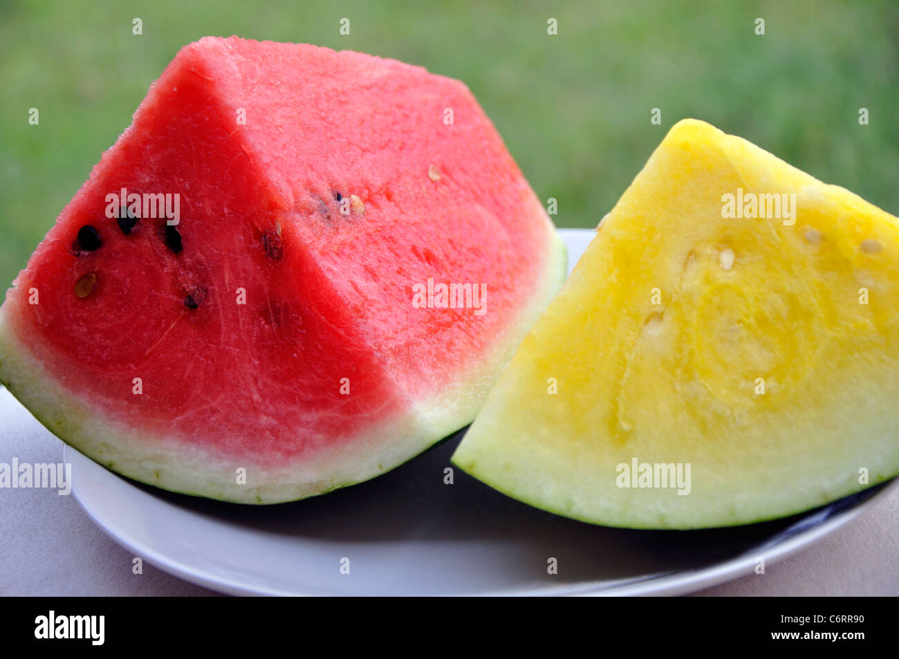 Red and yellow watermelons Stock Photo - Alamy