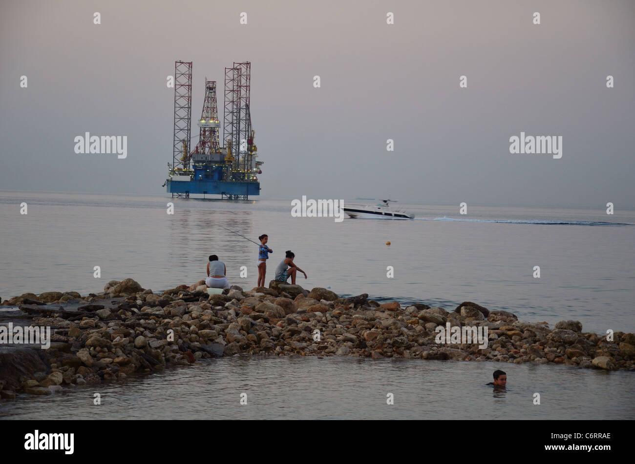 A jackup oil rig lies in the shallow waters of the Red Sea off the ...