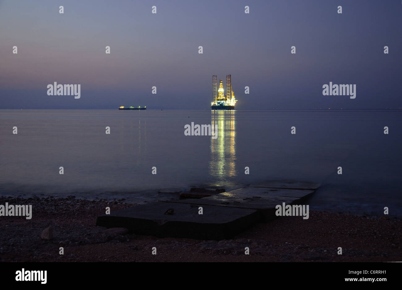 A jackup oil rig lies in the shallow waters of the Red Sea off the ...