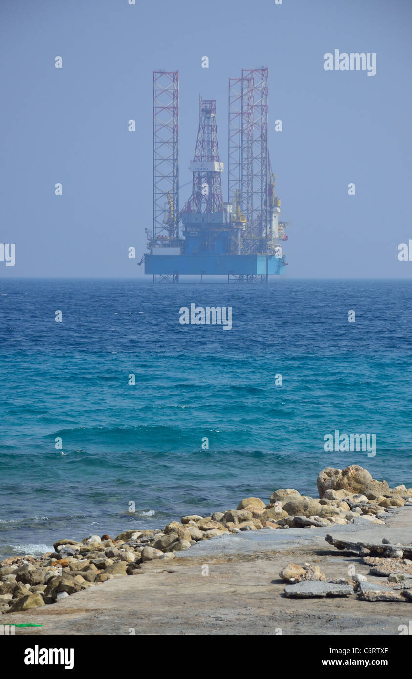 A jackup oil rig lies in the shallow waters of the Red Sea off the ...