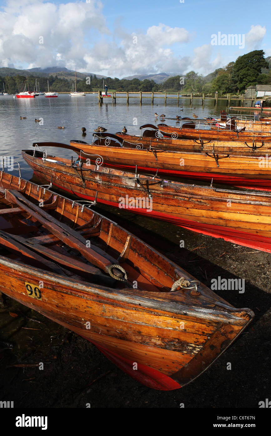 [Rowing boats] and [sailing yachts] in morning sun on [Lake Windermere ...
