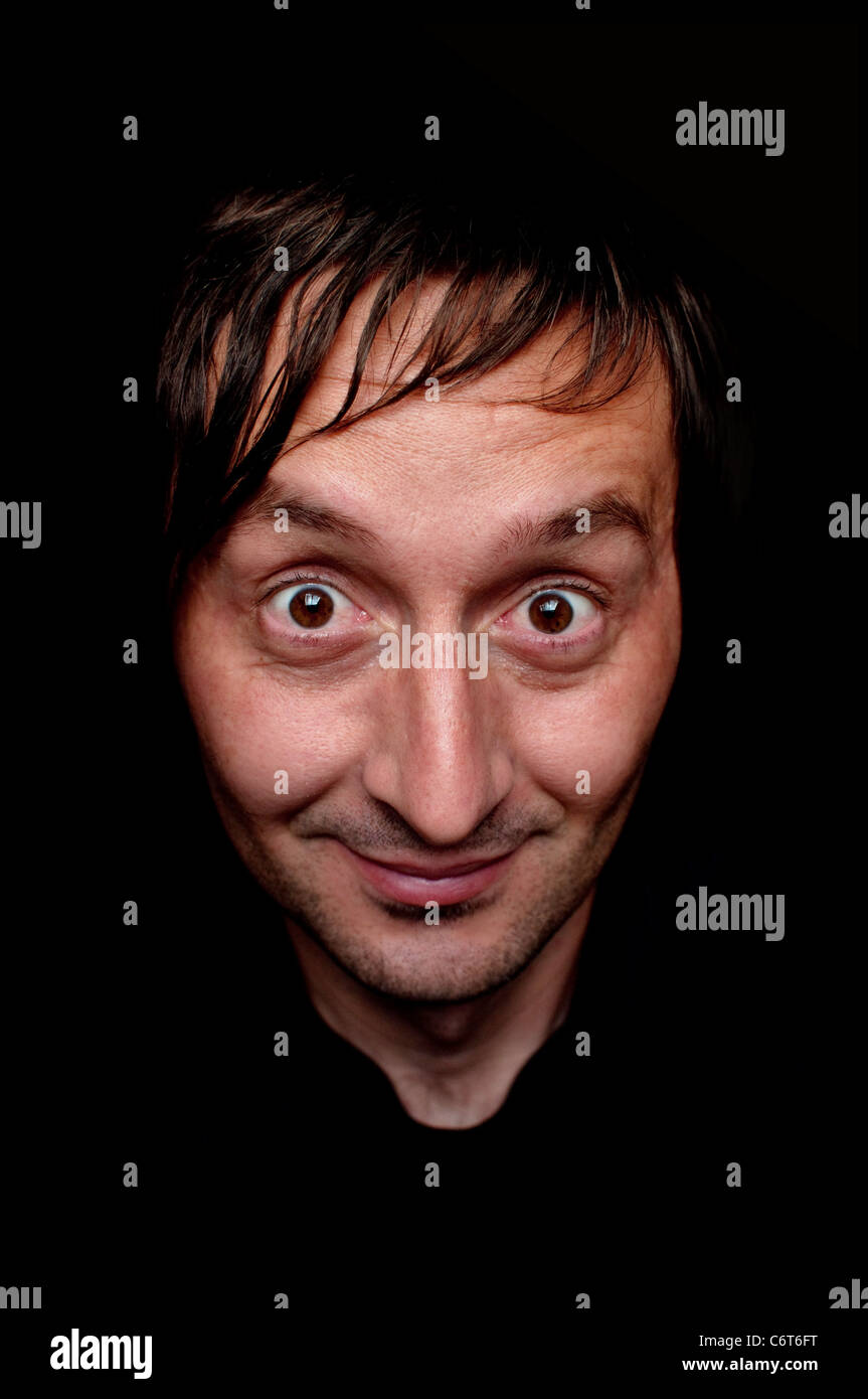 HAppy young man, eyes open wide, close up portrait Stock Photo - Alamy HAppy young man, eyes open wide, close up portrait Stock Photo - Alamy