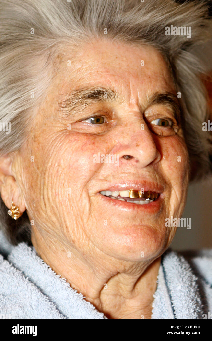 Gold tooth woman hi-res stock photography and images - Alamy