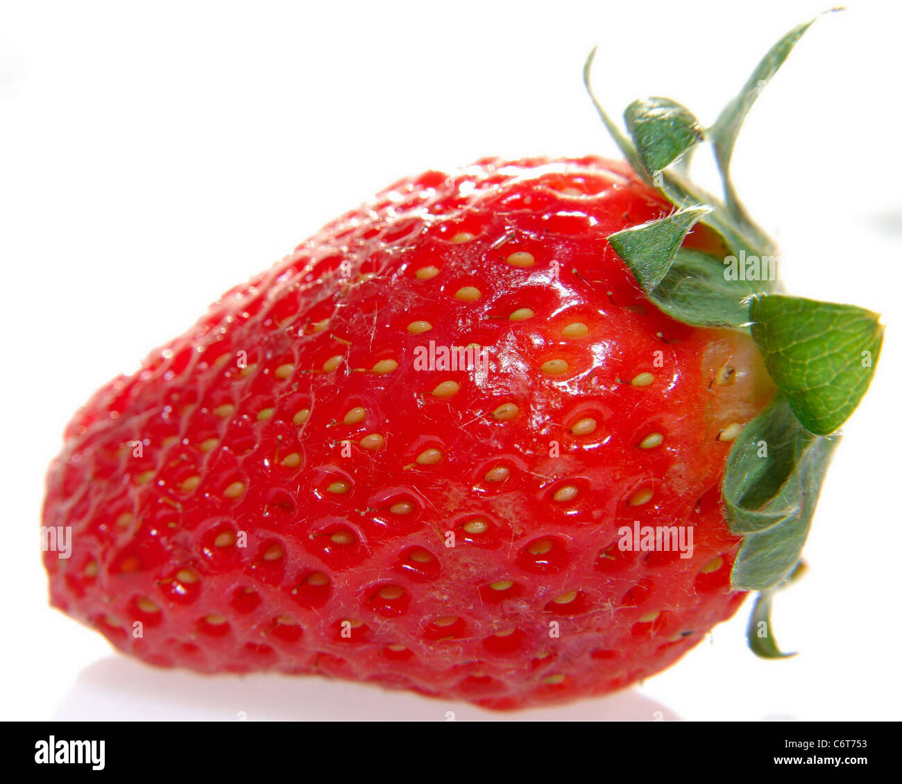 Ripe single strawberry isolated on white background Stock Photo - Alamy