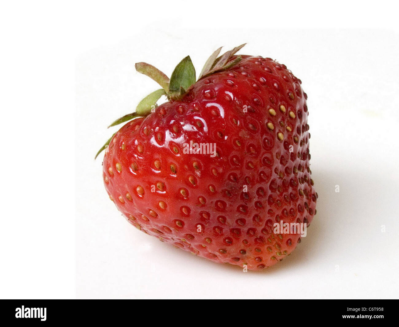 Fresh wet strawberry, isolated on a whit background Stock Photo - Alamy