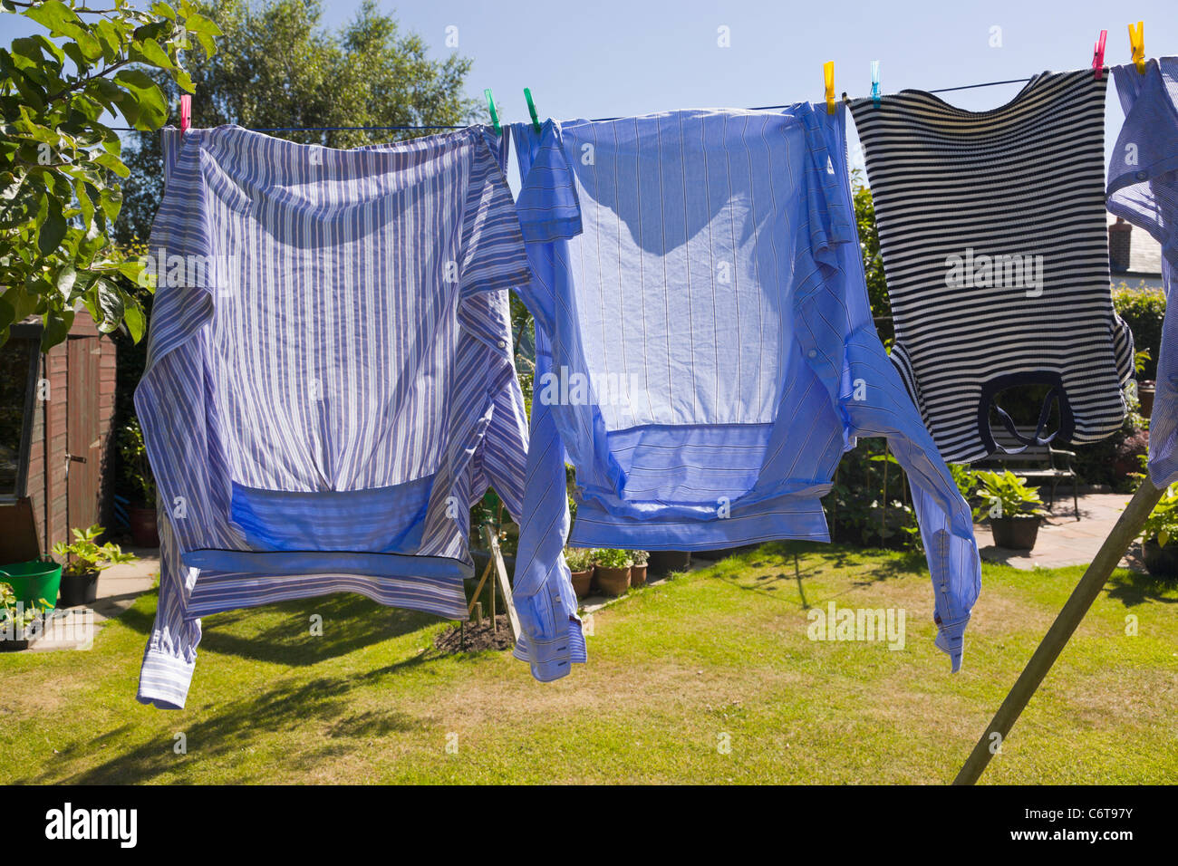 Washing hanging on clothes line Stock Photo - Alamy