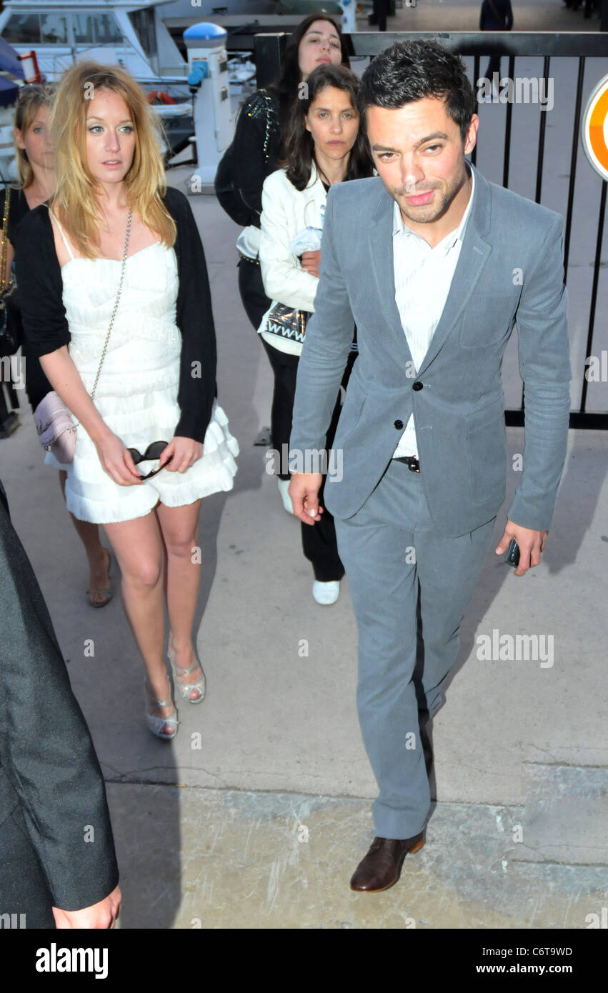 Guest and Dominic Cooper during the 2010 Cannes Film Festival - Day 8 ...