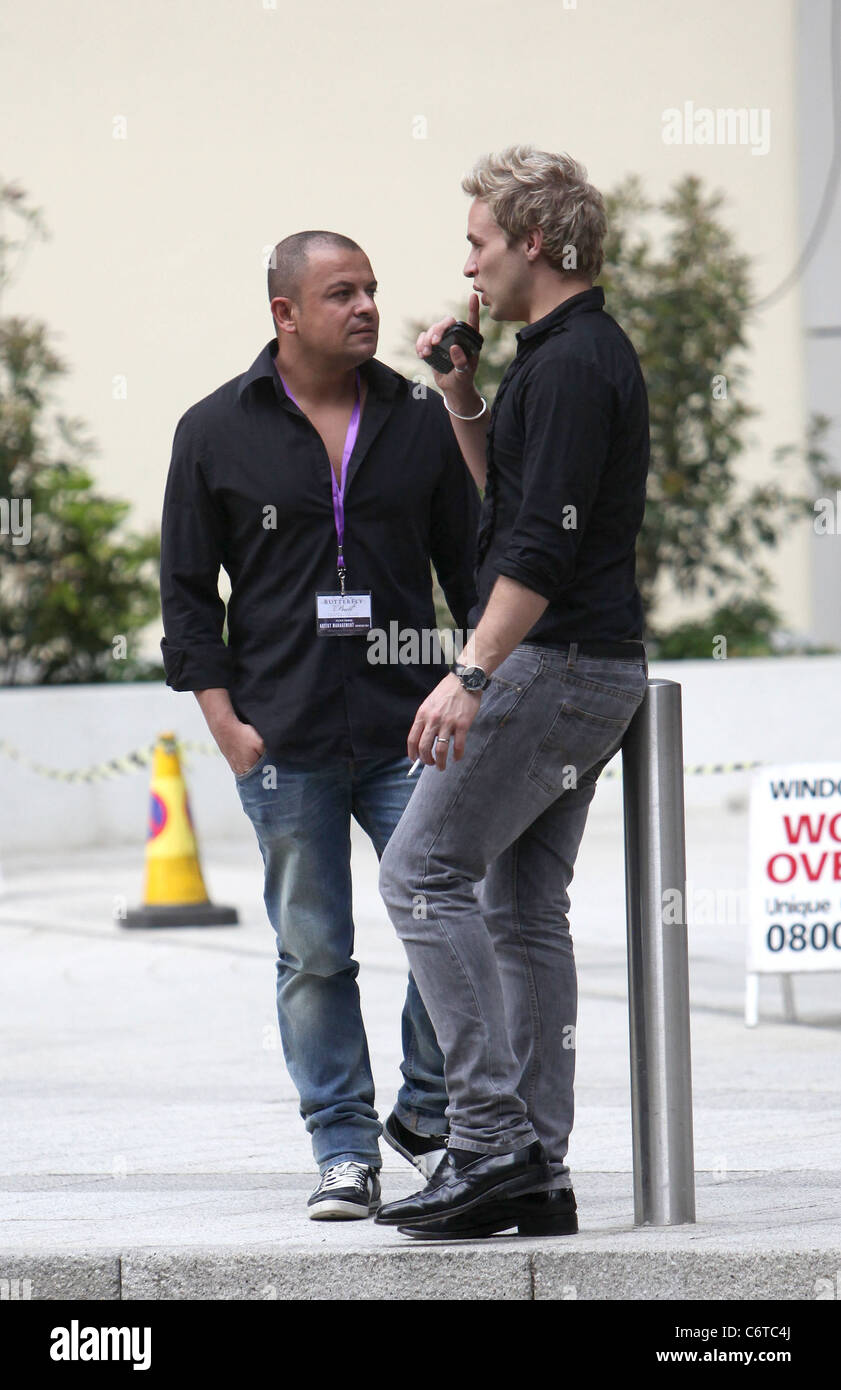 Peter Andre's brother Chris Andre smoking outside the same hotel Kerry ...