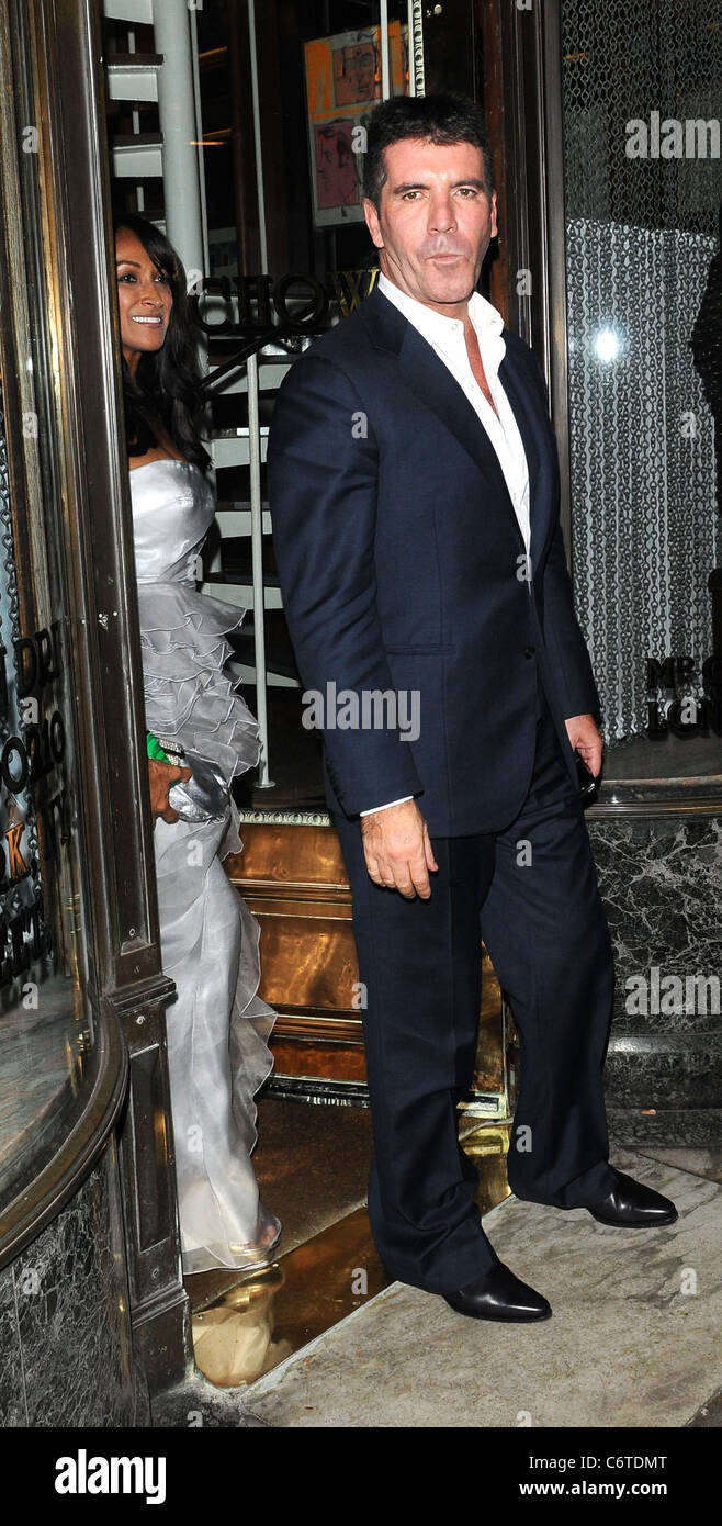 Simon Cowell and Jackie St Claire leave Mr Chows restaurant Lonson ...