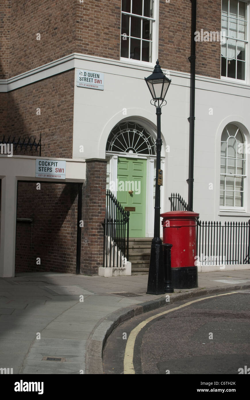 A traditional red post box next to Cockpit Steps in St James' London ...