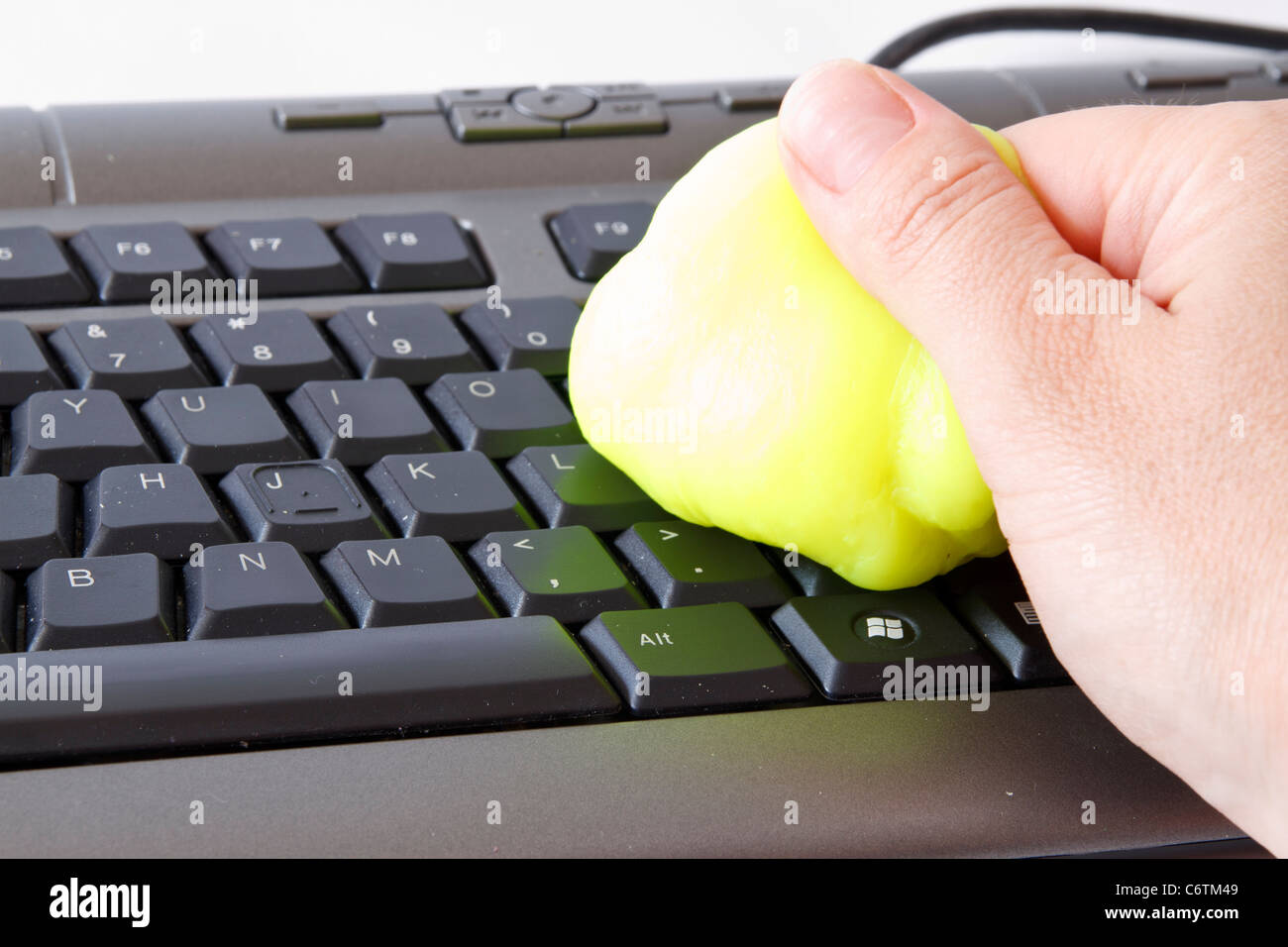hand who clean the keyboard with a special sponge Stock Photo - Alamy