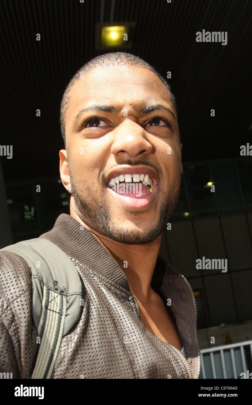 Jonathan gill aka jb jls arrive at heathrow airport london hi-res stock ...