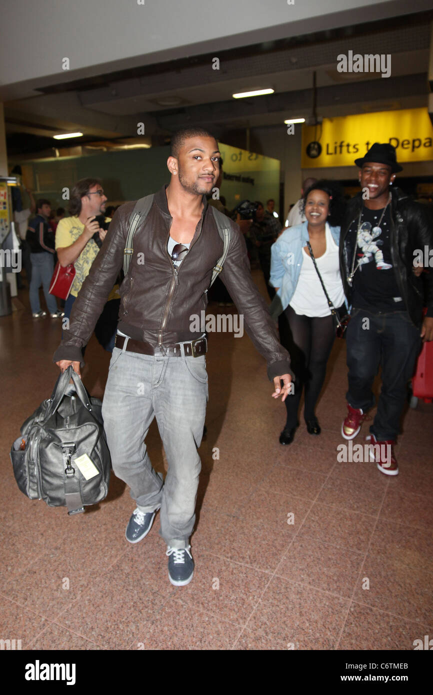 Jonathan Gill, aka JB, and Oritse JLS arrive at Heathrow Airport London ...