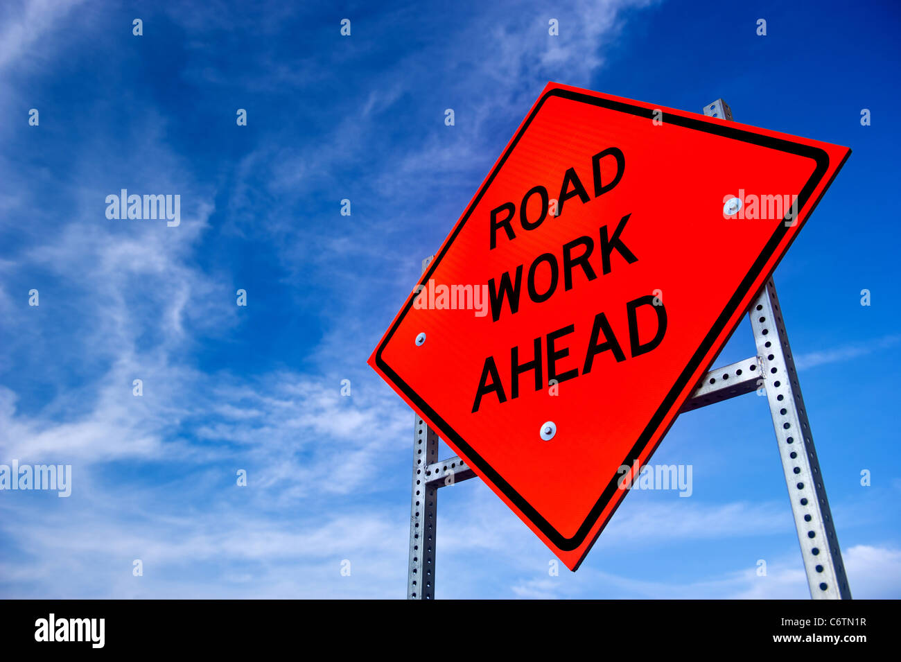 Orange Road work sign Stock Photo - Alamy