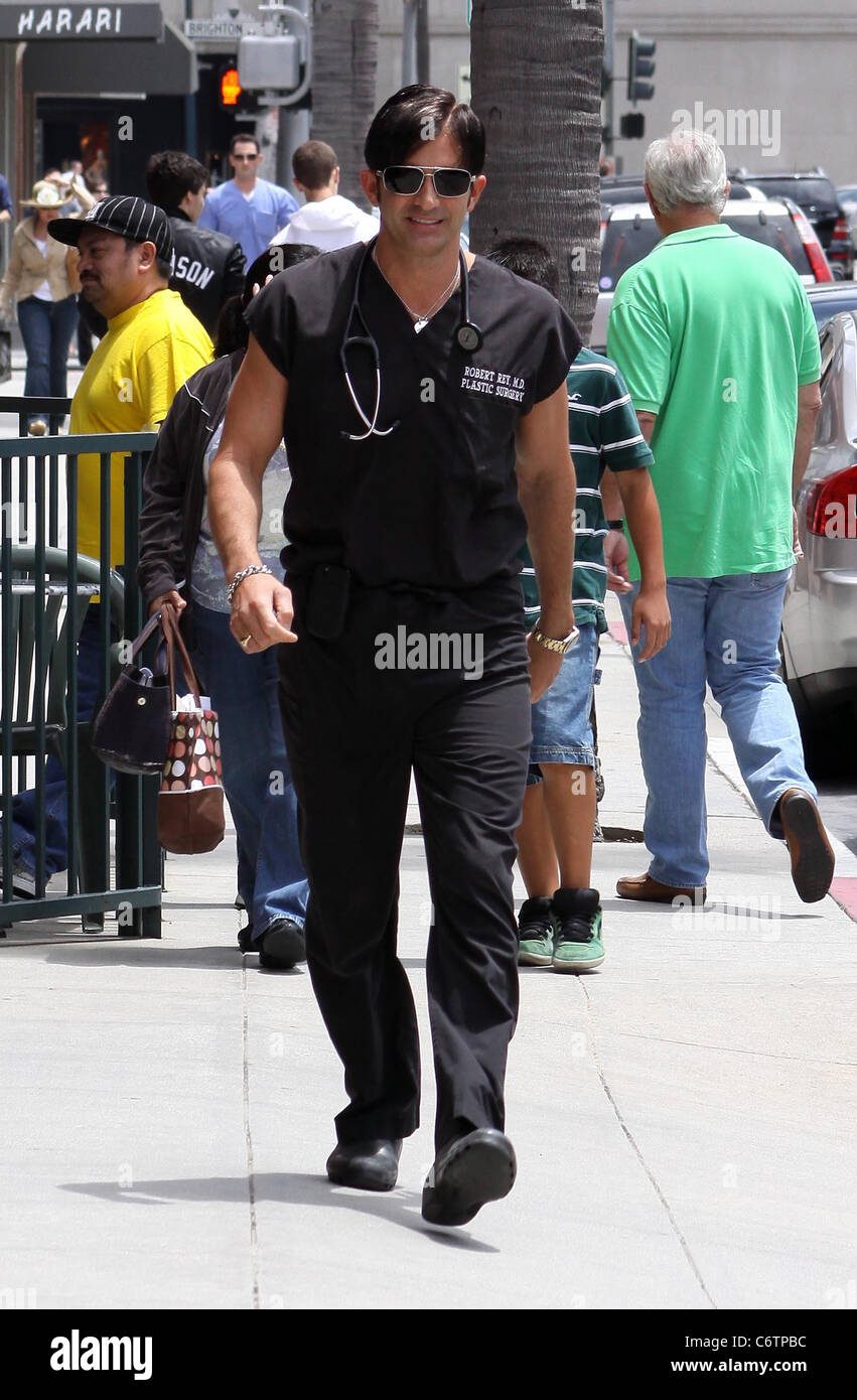 Dr. Robert Rey from 'Dr. 90210' leaves a medical building in Beverly ...