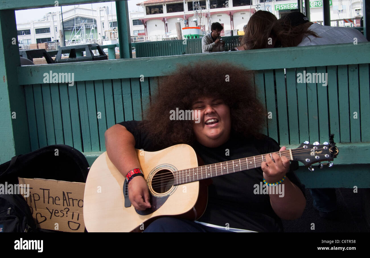 Female singing busker hi-res stock photography and images - Alamy