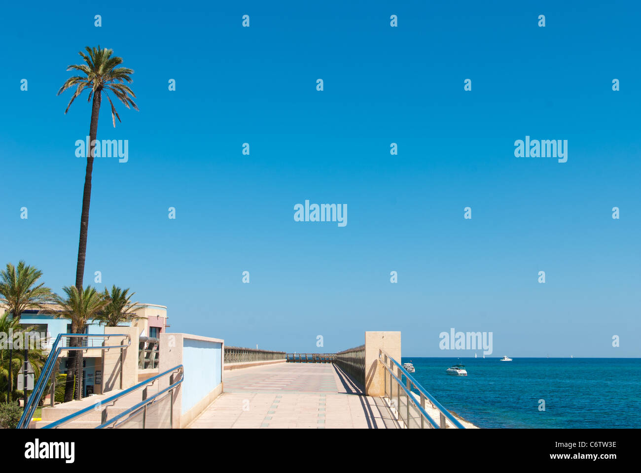 Scenic beach promenade on a breakwater mole Stock Photo - Alamy