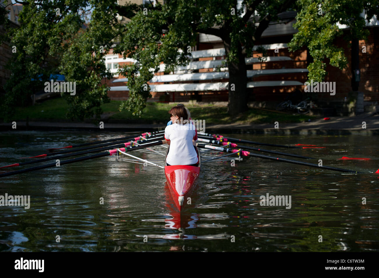 A ladies eight man (person) crew and cox rowing on the River Cam at ...