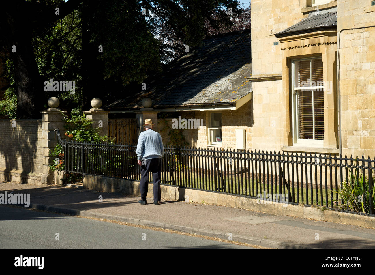 An elderly man walking through the village of Mickleton ...