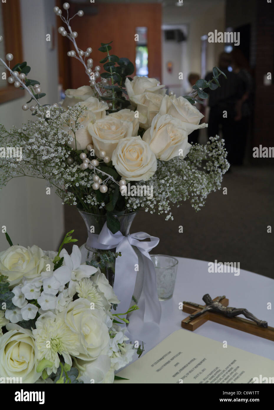 American Catholic wedding with beautiful bouquet of white roses from ...
