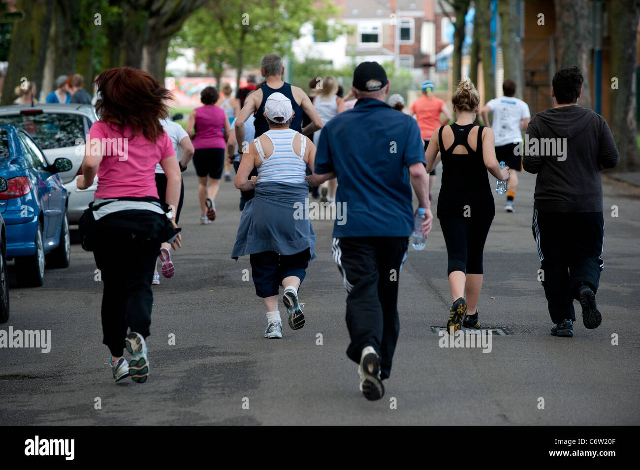 Joggers in a park hi-res stock photography and images - Alamy