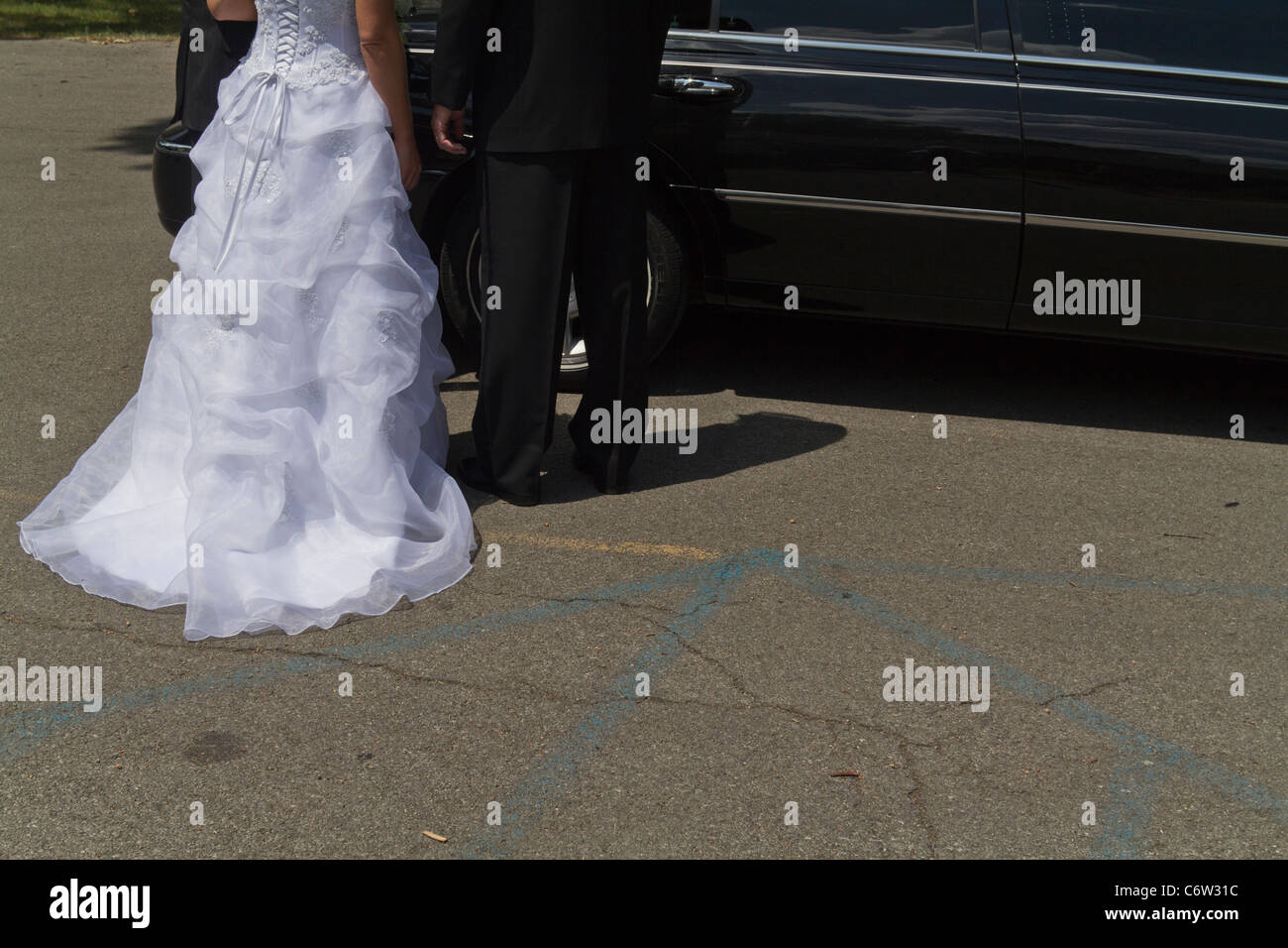 Wedding couple a bride with a groom outside rear view in USA US hi-res ...
