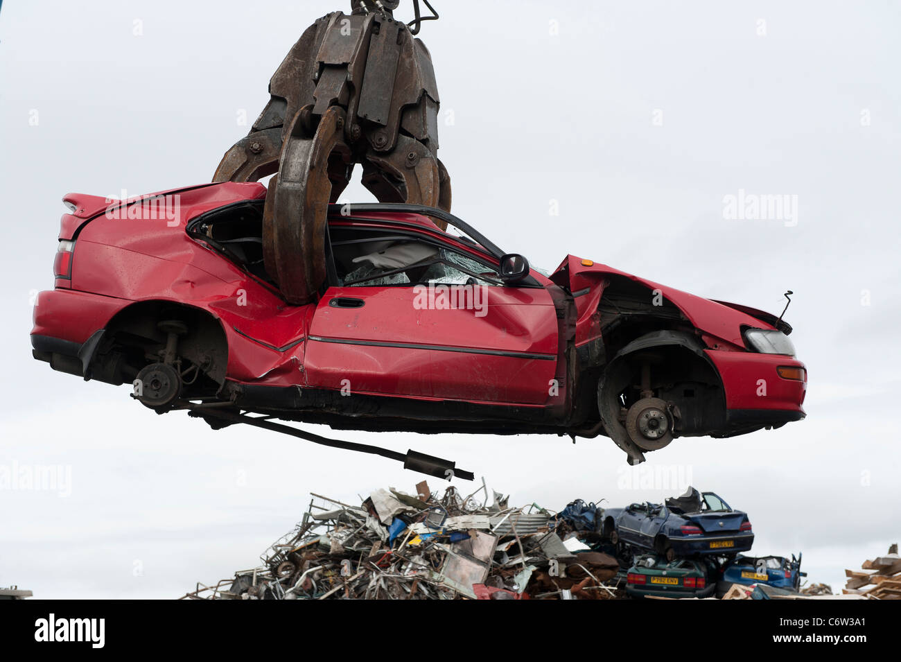 Car crushed by crane hi-res stock photography and images - Alamy