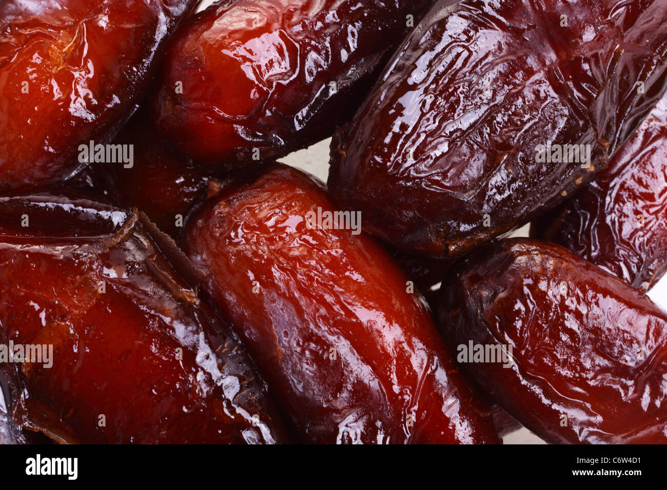 Dried date fruits background texture Stock Photo - Alamy