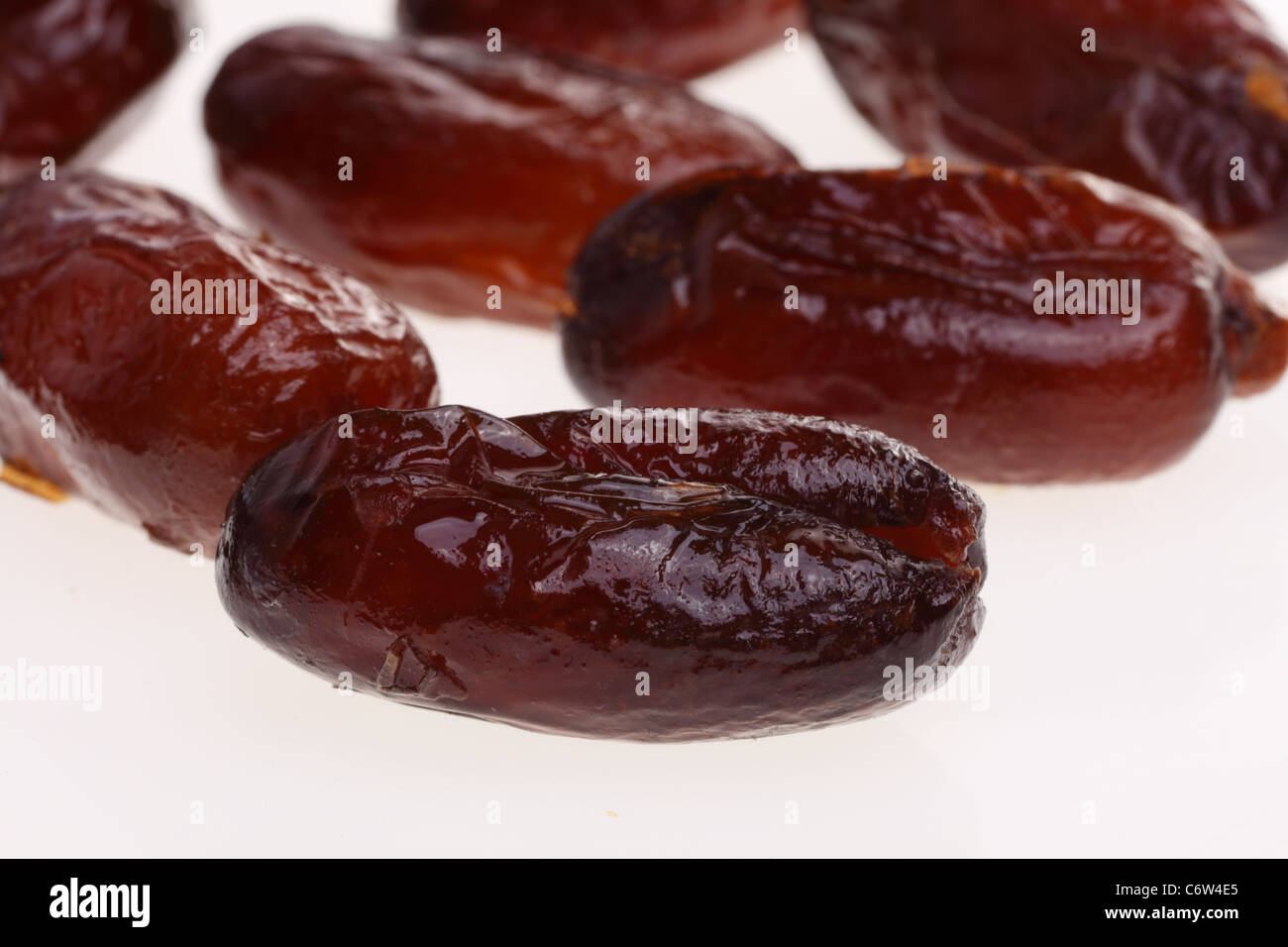 Dried date fruits isolated on white background Stock Photo - Alamy